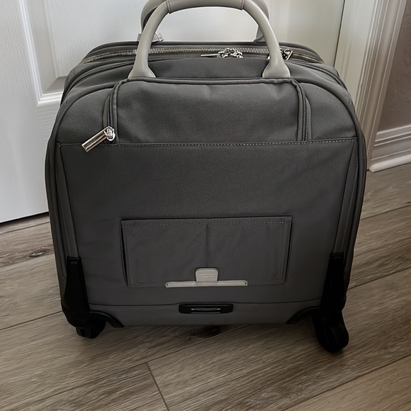 Tumi | Bags | Tumi Larkin 4 Wheel Compact Carryon | Poshmark